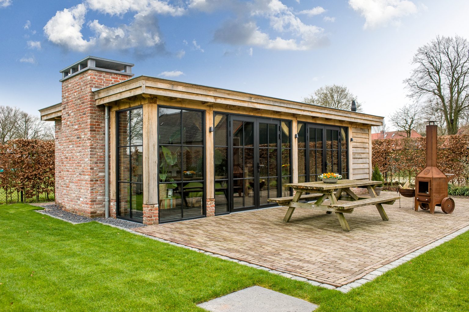 Luxe tuinhuis met sedum dak en glaswanden – project 201 - Eikentuinhuis